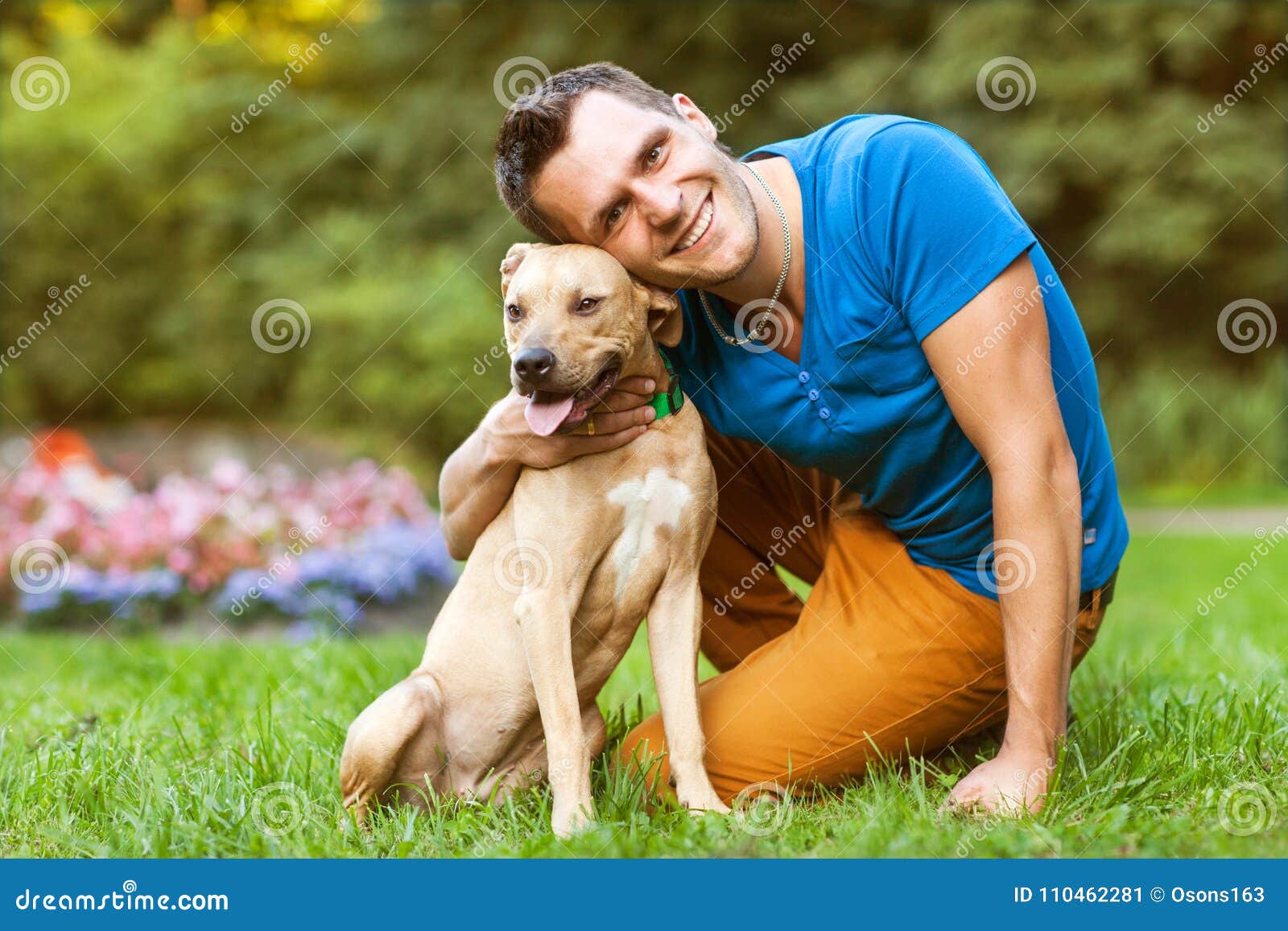 Guy with His Dog Hugging in the Park Stock Image - Image of handsome ...