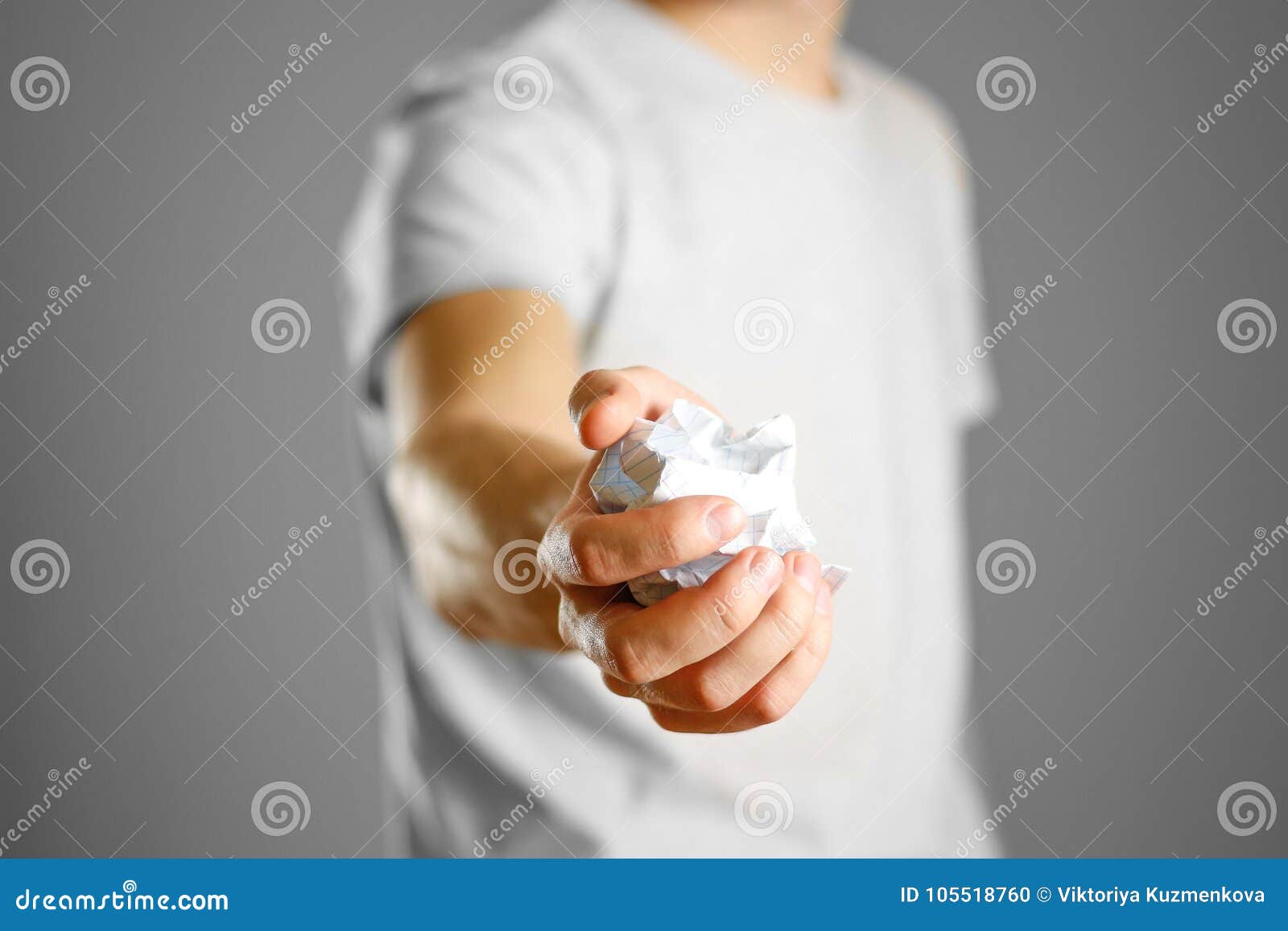The Guy is Holding a Crumpled Piece of Paper in His Hands Stock Photo ...