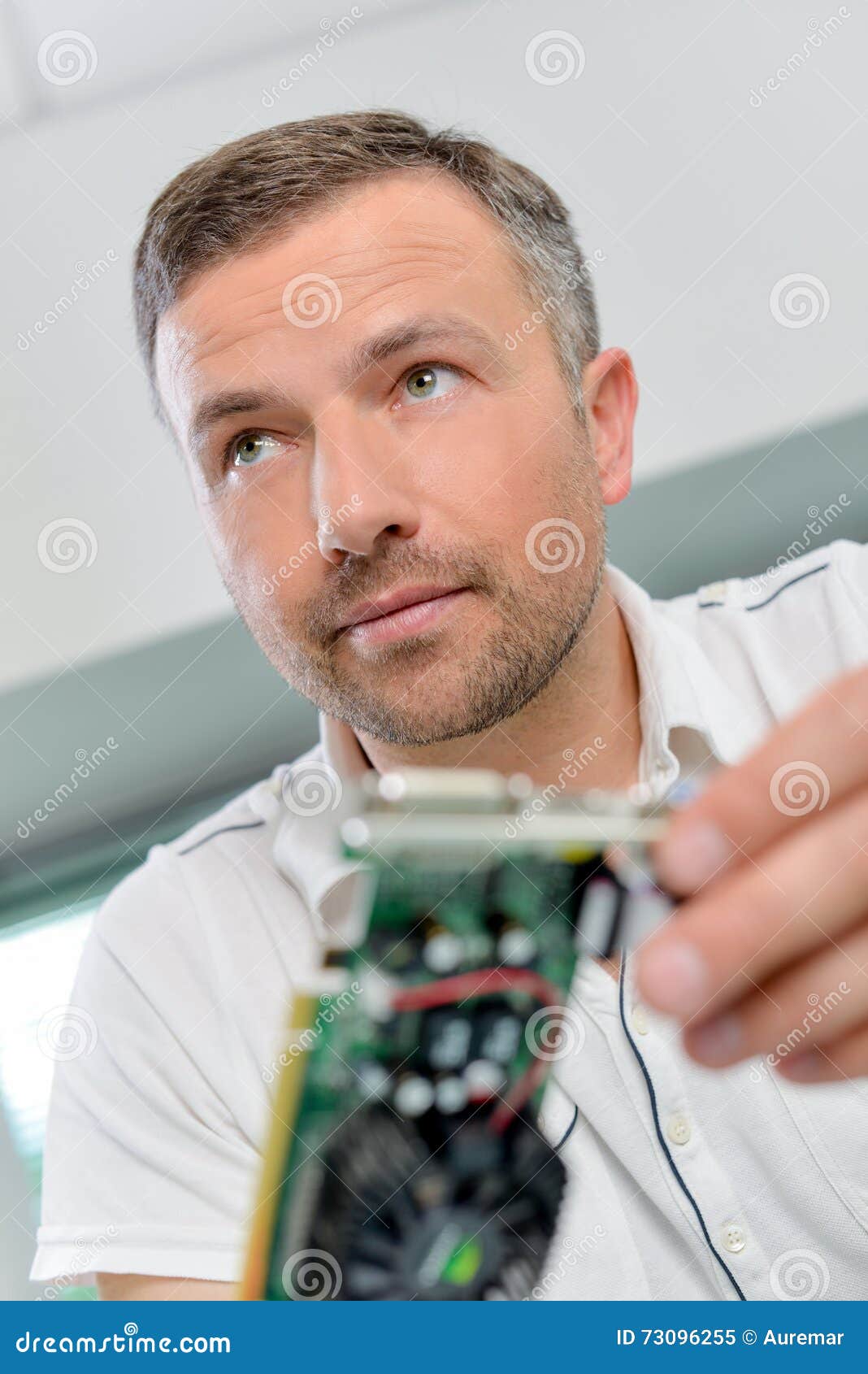 Guy Holding Graphics Card Stock Photos - Free & Royalty-Free Stock ...
