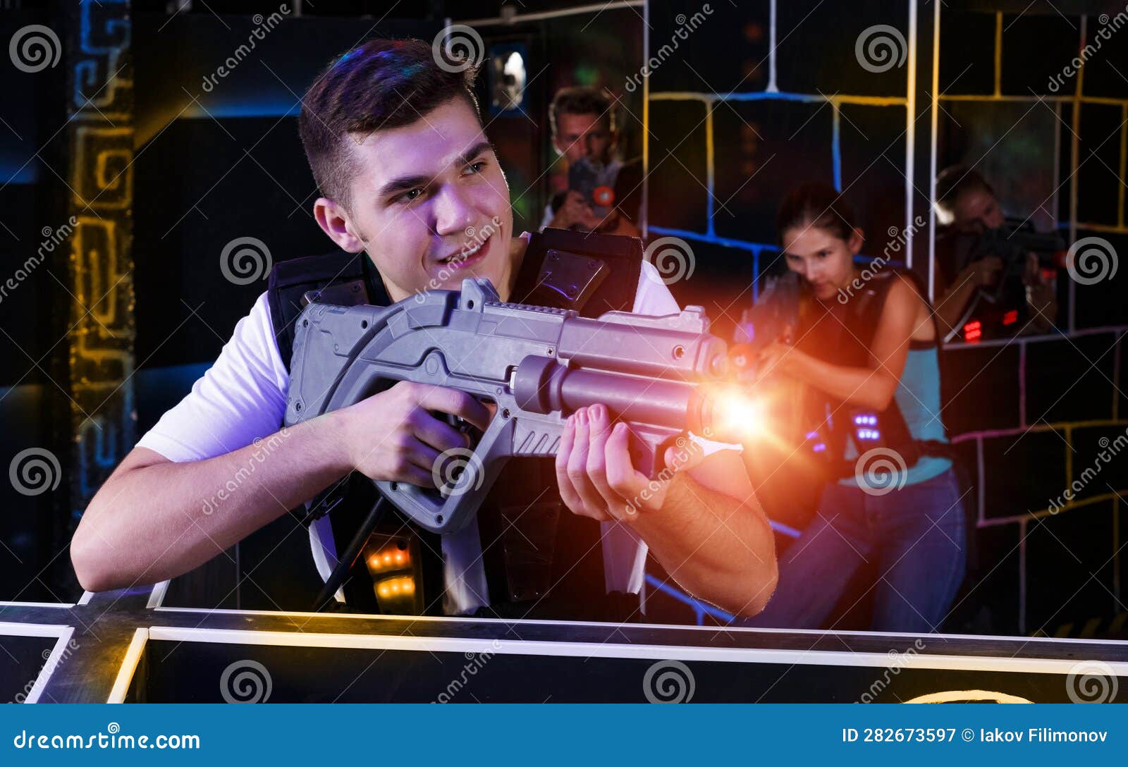 Guy Holding Laser Pistol Playing Laser Tag Game Stock Image - Image of ...
