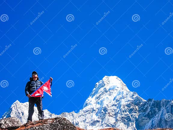Guy Holding National Flag of Nepal Against Himalaya Mountain Peak ... Guy Holding National Flag of Nepal Against Himalaya Mountain Peak ...