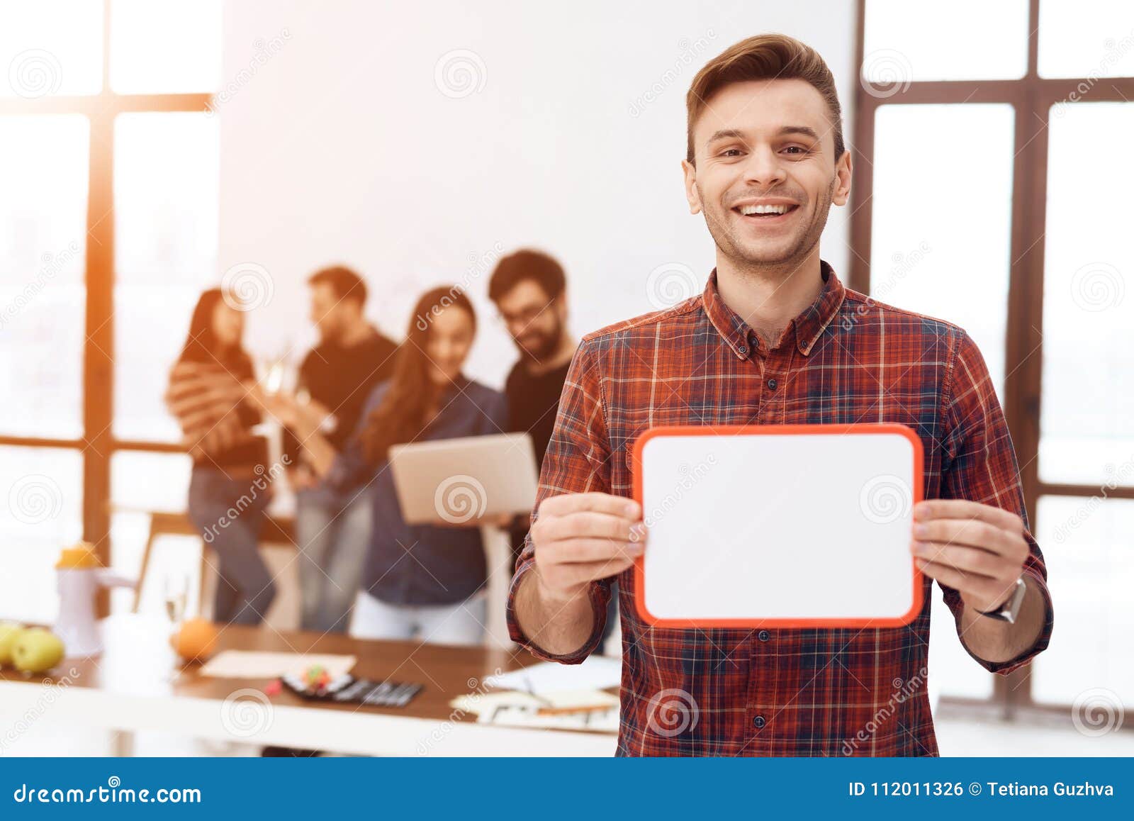 The Guy is Holding a White Board. Stock Photo - Image of agent ...