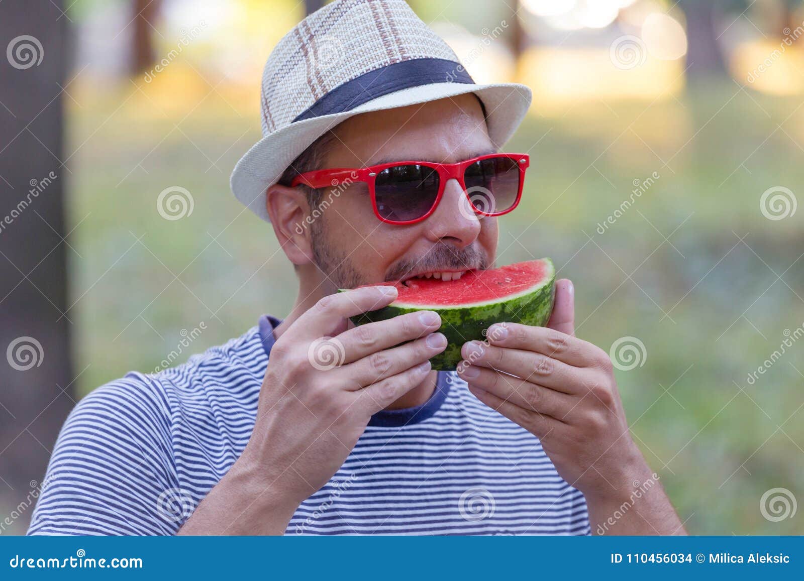 Guy Holds a Piece of Watermelon and Eating Stock Photo - Image of ...