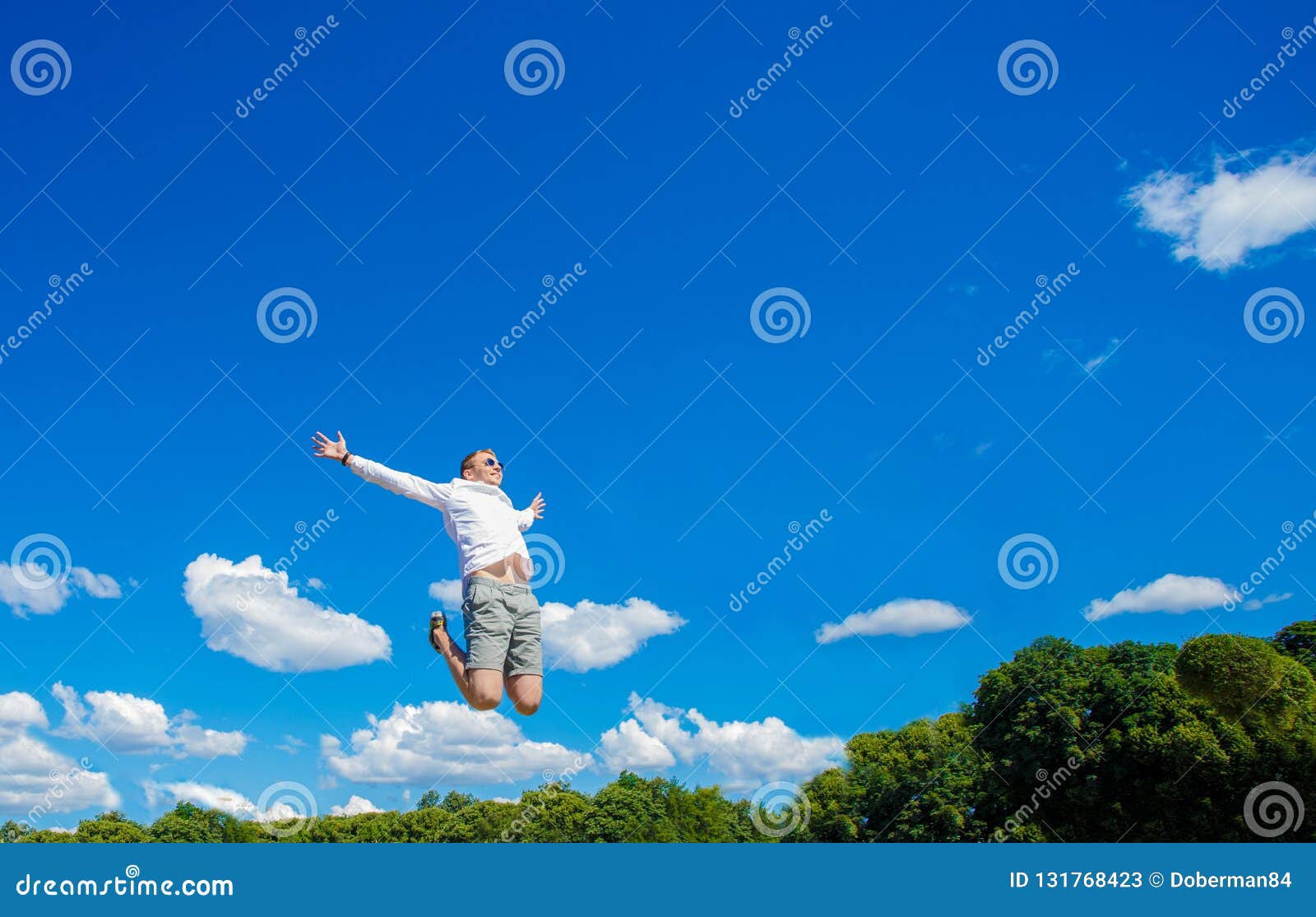 Guy is Hovering in the Air. the Guy is Hovering in the Air Against the ...