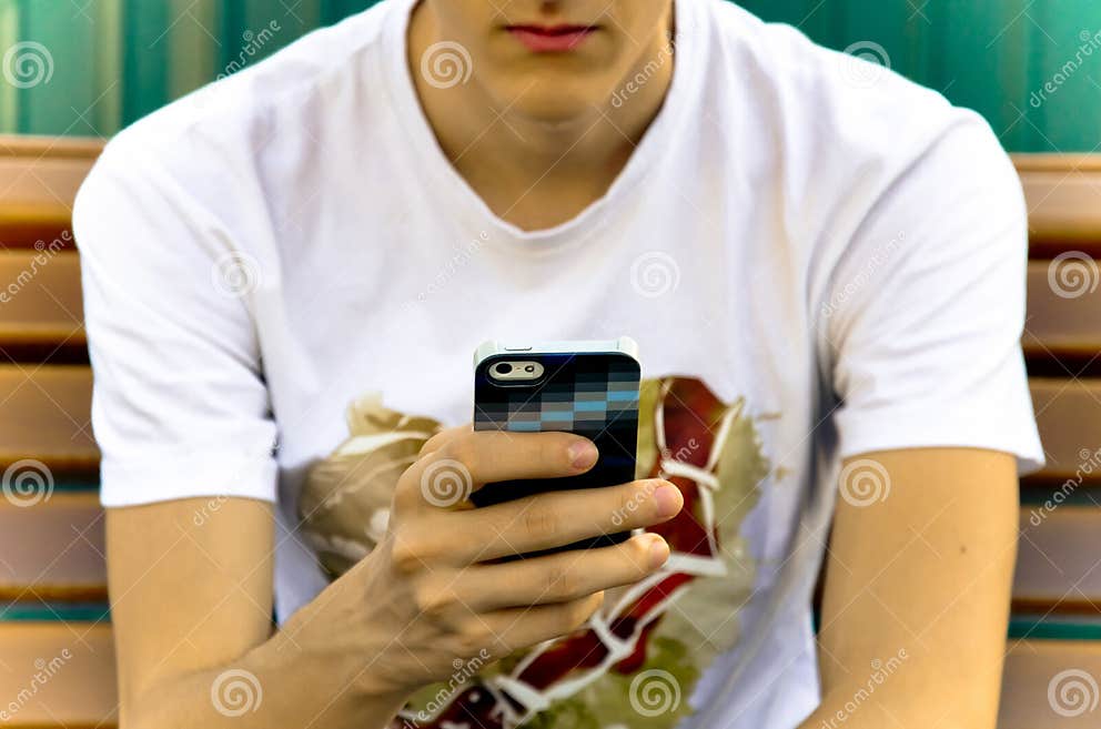 Guy with iPhone editorial image. Image of message, iphone - 59795555