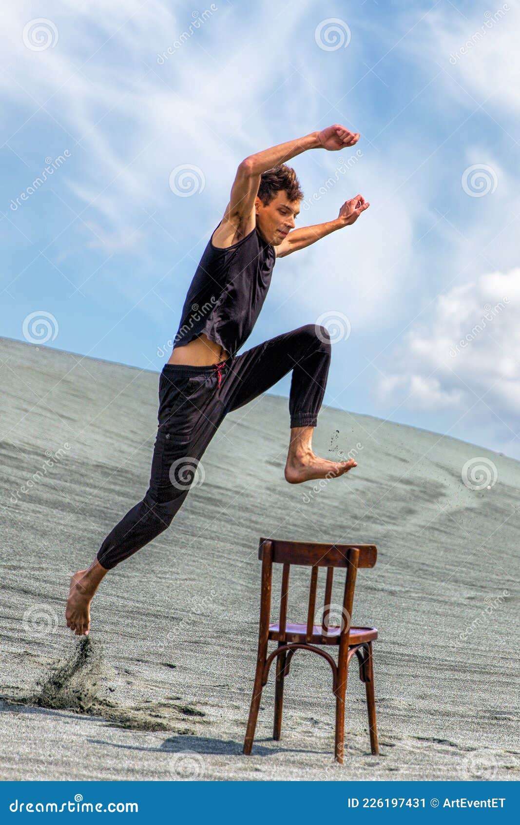 Guy Jumping Over Chair in Desert Stock Image - Image of slim, muscular ...