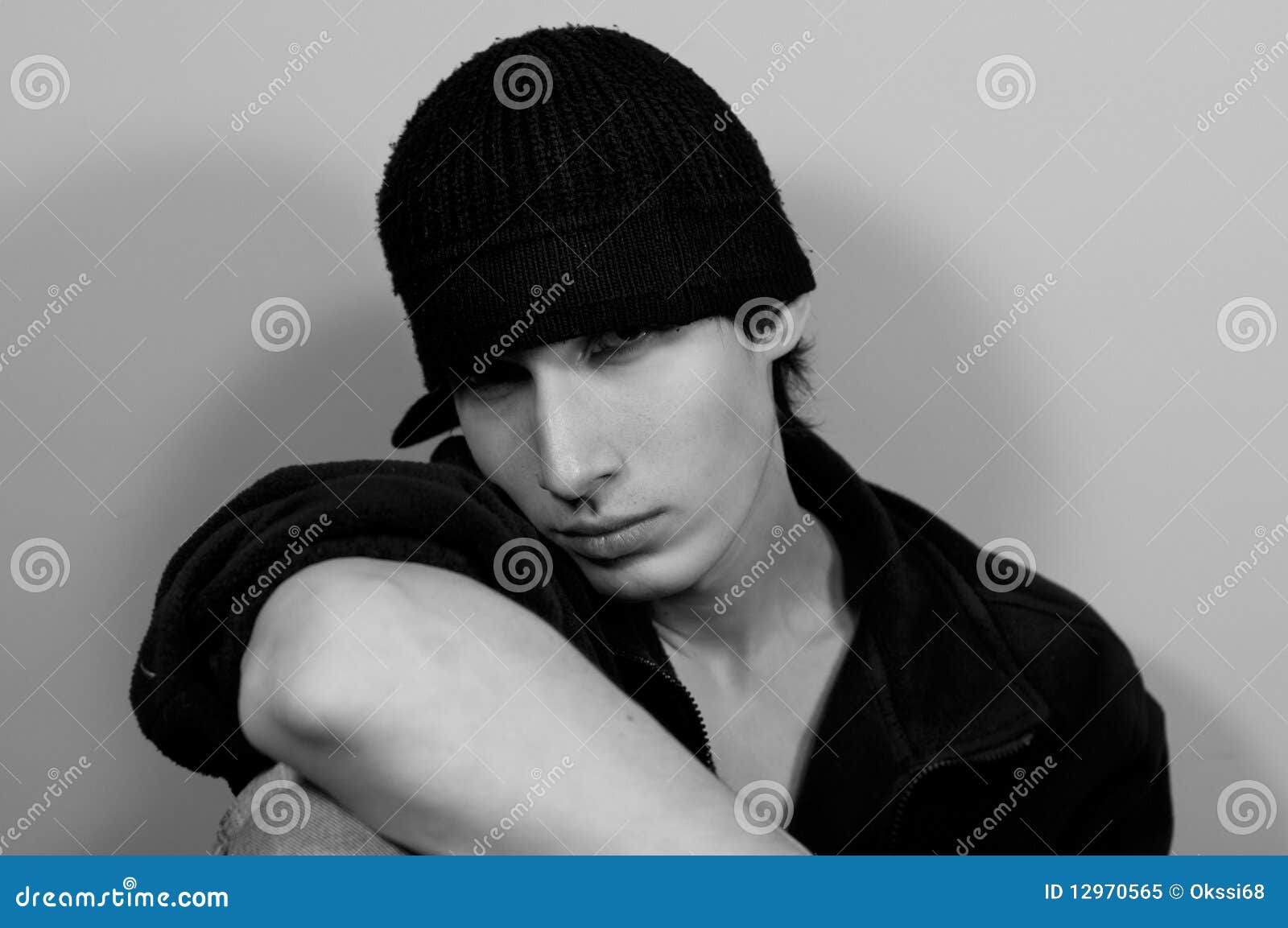 Guy in a knitted cap stock image. Image of melancholy - 12970565