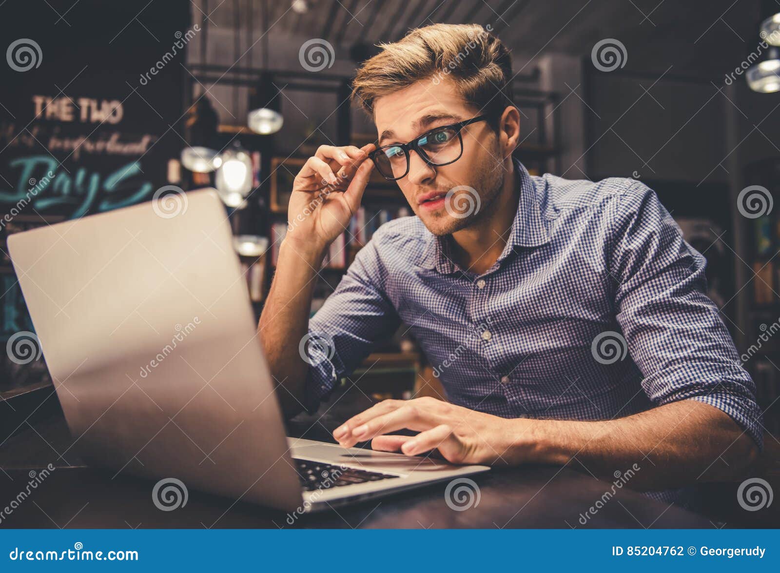 Guy in the library stock photo. Image of eyeglasses, college - 85204762