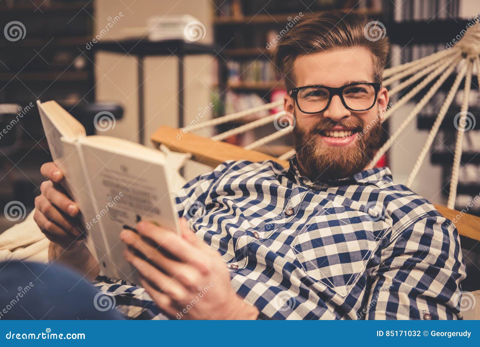 Guy in the library stock photo. Image of happy, expression - 85171032