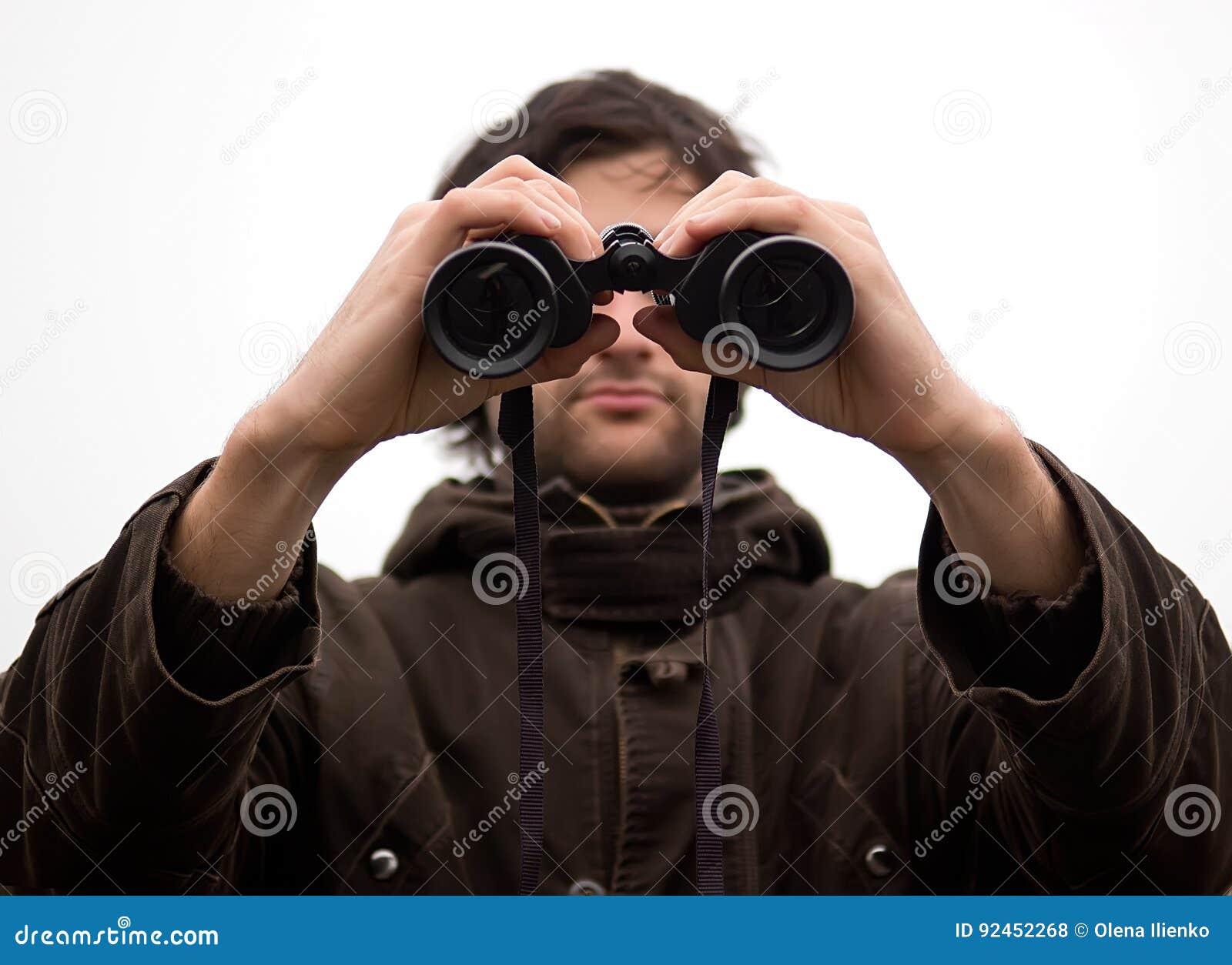 Guy looking at binoculars stock photo. Image of person - 92452268
