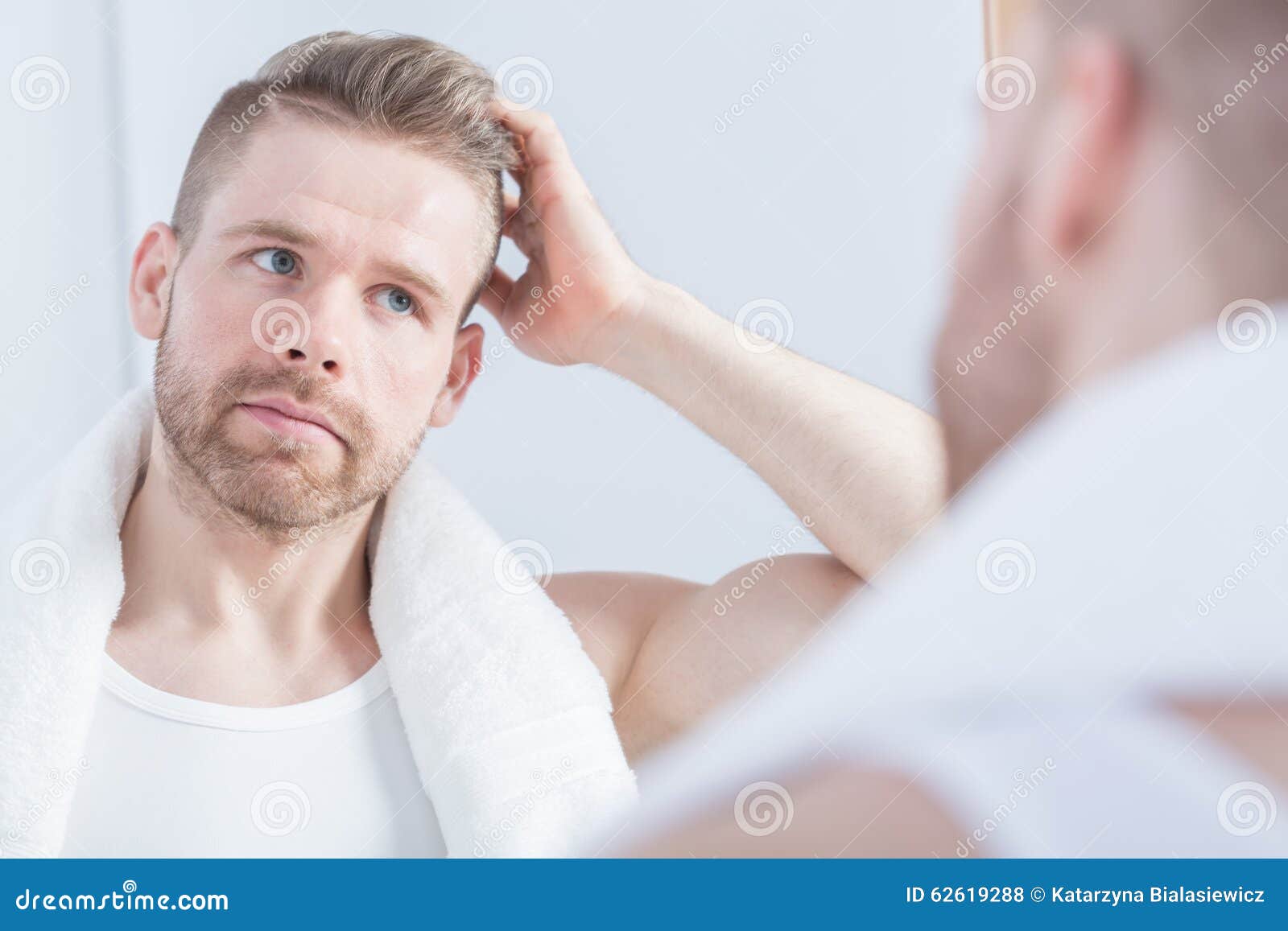 Guy looking at the mirror stock photo. Image of beard - 62619288