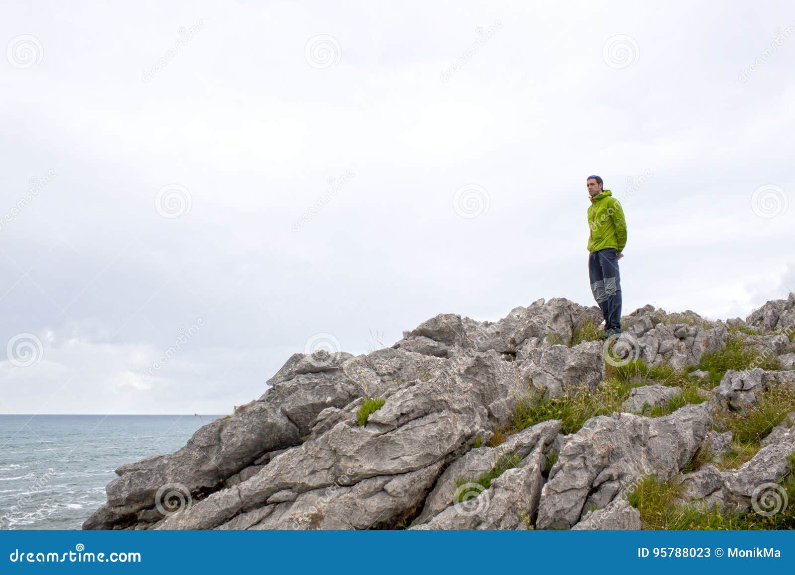 Guy Looking at the Sea from the Rock Stock Image - Image of atlantic ...