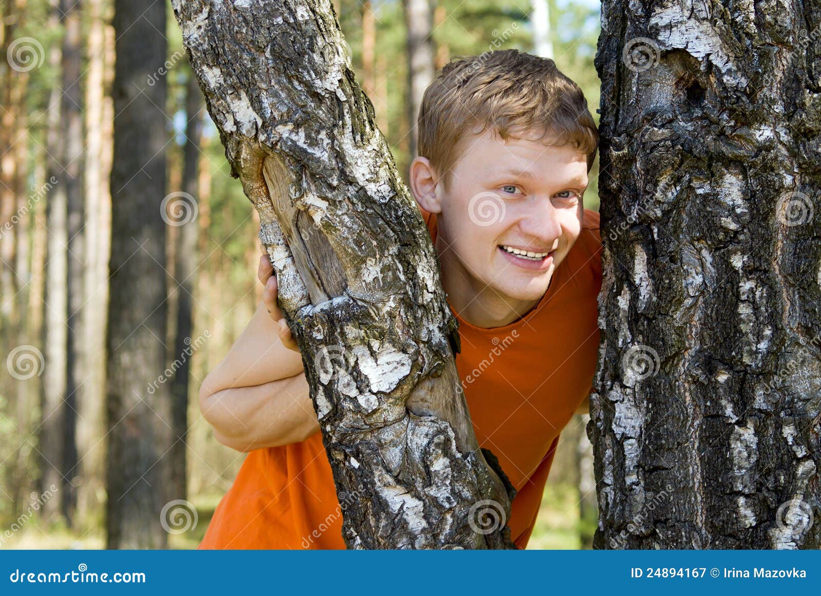 The Guy Looks between the Trees Stock Image - Image of leisure, happy ...