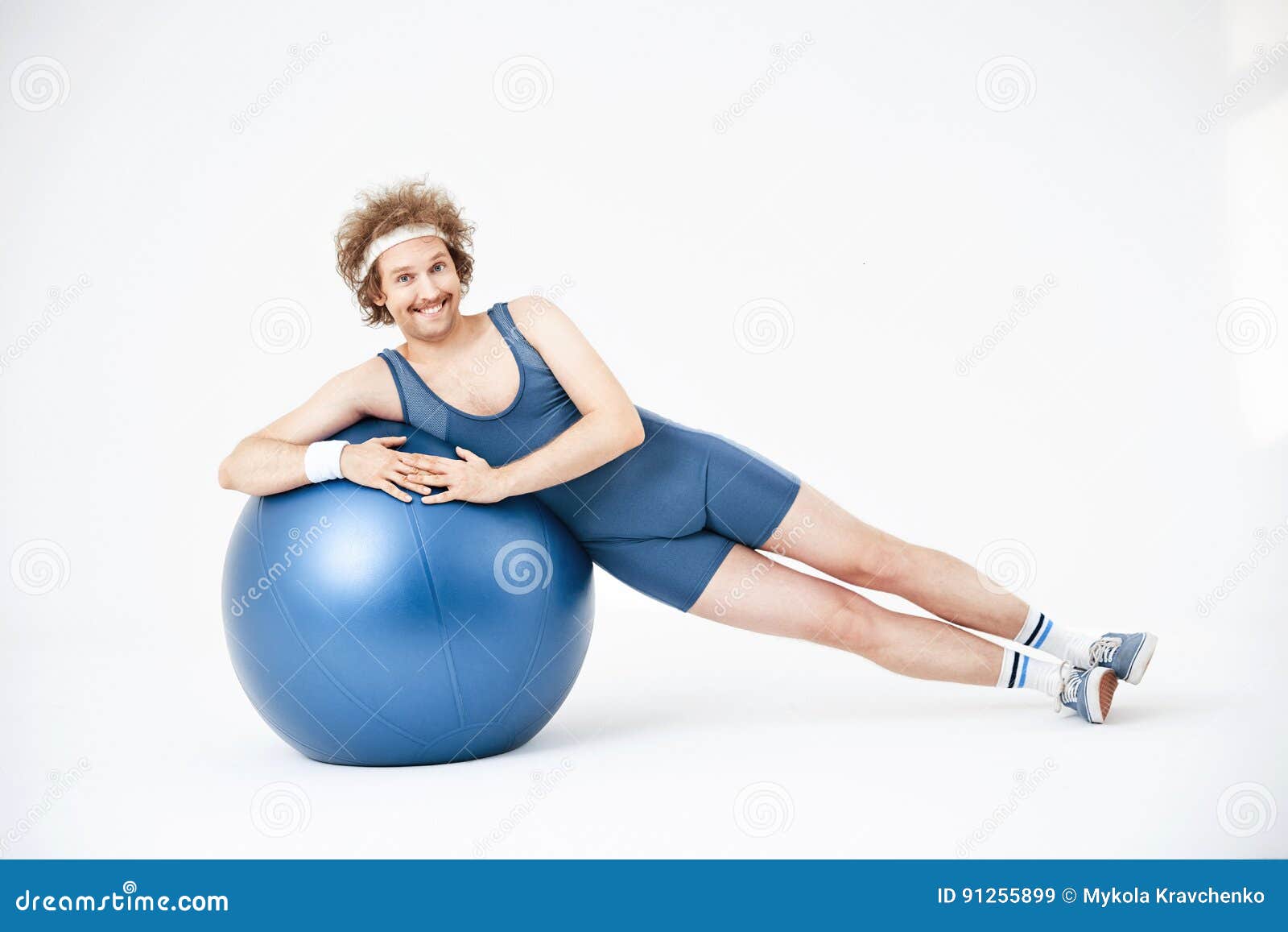 Guy Lying Over Exercise Ball. Side Lying. Hands on Ball Stock Image ...