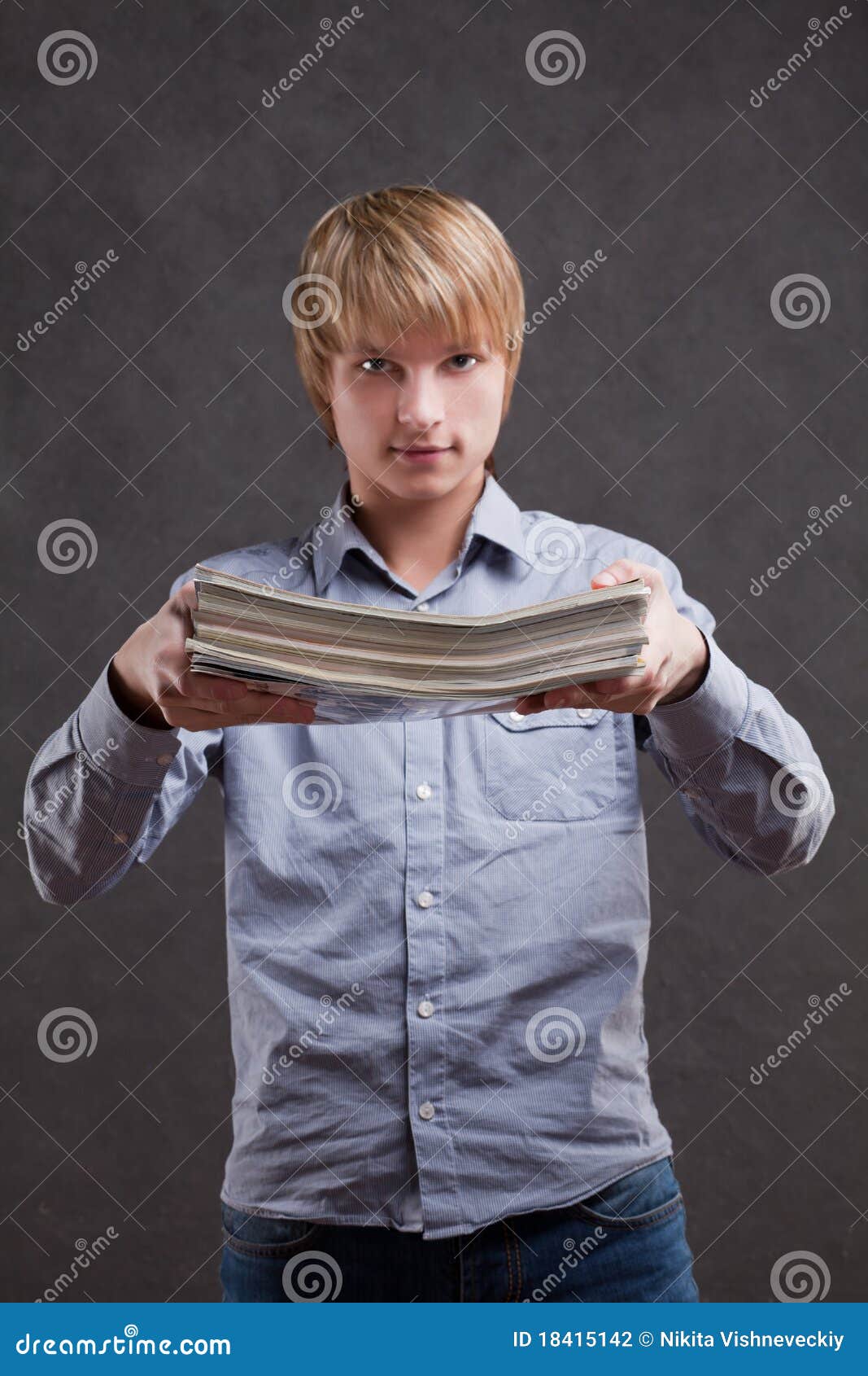 Guy with magazines stock photo. Image of caucasian, people - 18415142