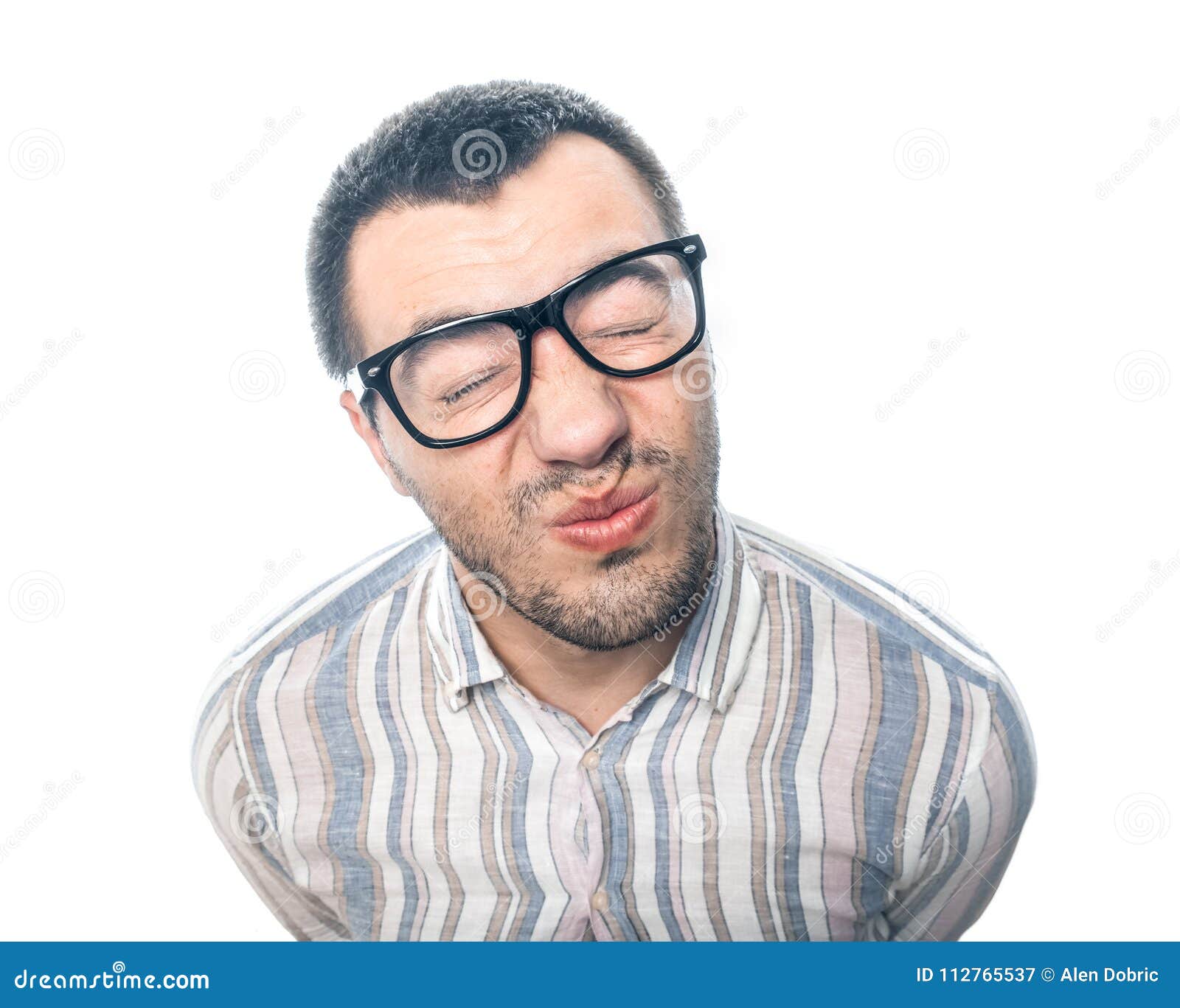 Guy make a grimace stock image. Image of isolated, male - 112765537