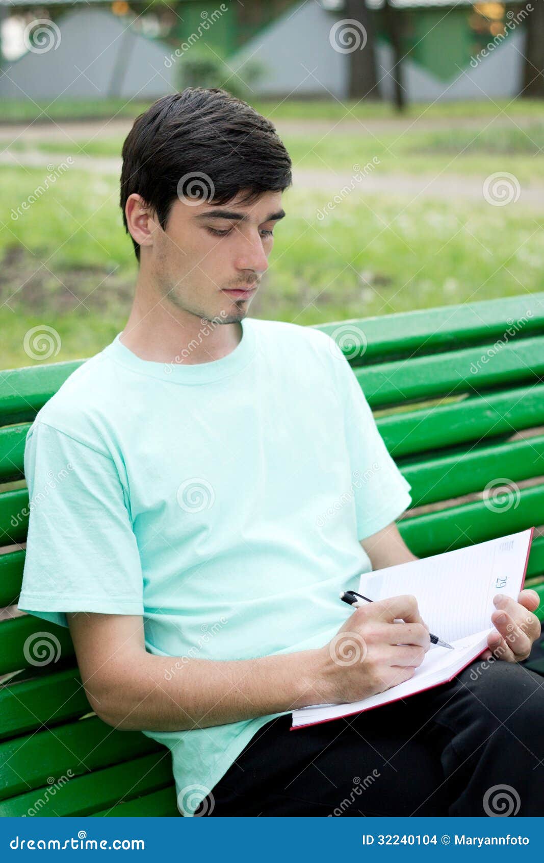 Guy Makes Entry in a Notepad Stock Photo - Image of concepts, adult ...