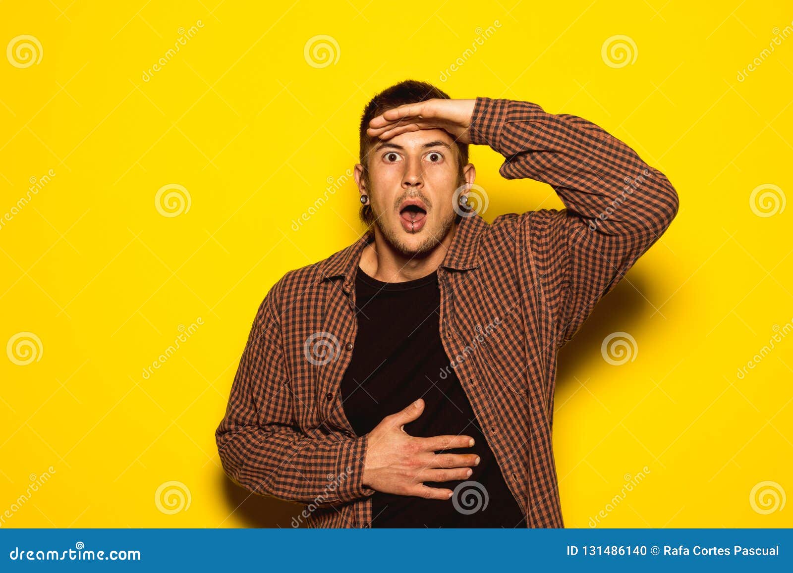 Guy Making the Gesture of Looking at the Camera Stock Photo - Image of ...