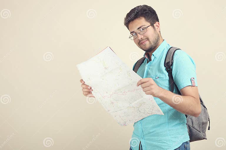 A guy with a map stock photo. Image of studio, human - 97998150