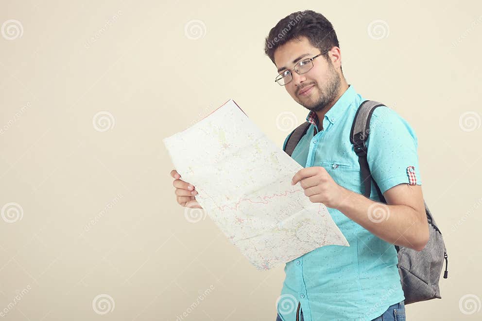 A guy with a map stock photo. Image of studio, human - 97998150