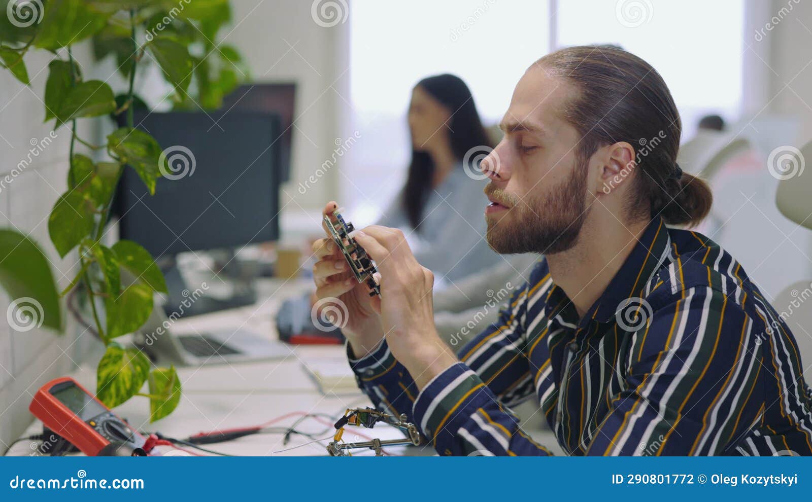 Guy Master Checking, Looking at the Electronic Device. Man Holding ...