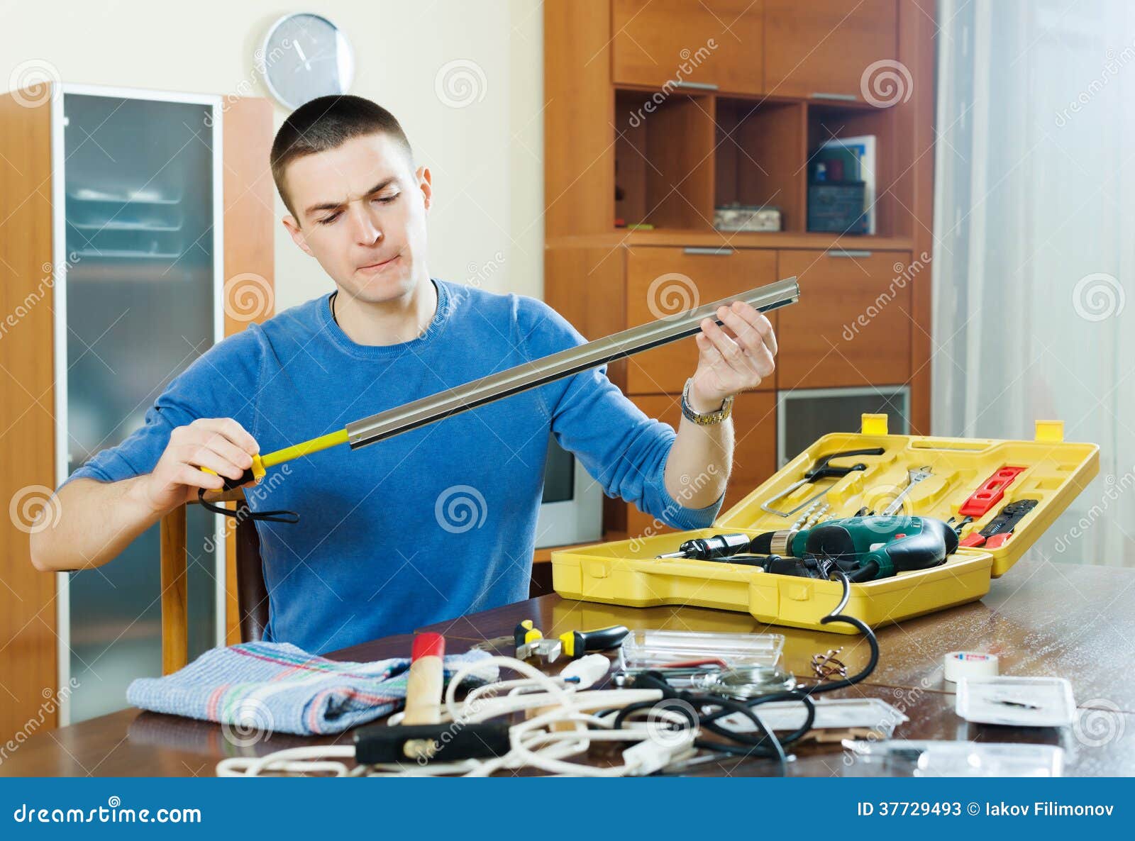 Guy Measuring Something with Tape Measure Stock Image - Image of ...
