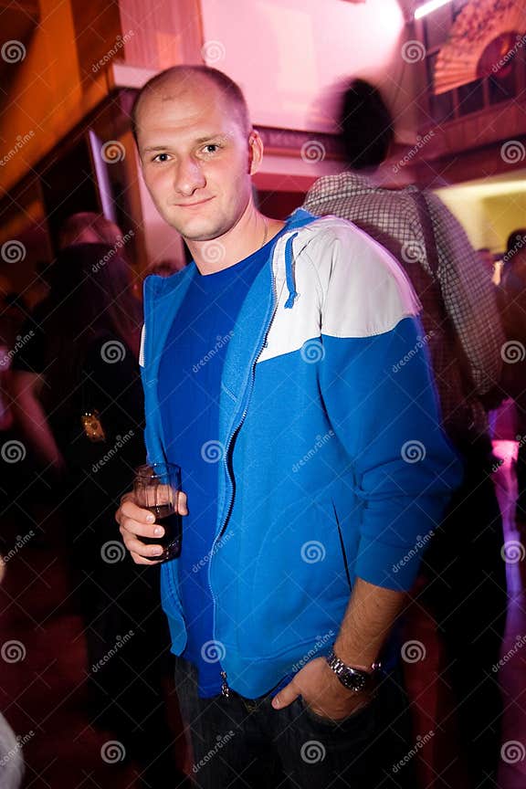 Guy in the nightclub stock image. Image of coat, nightclub - 17925665
