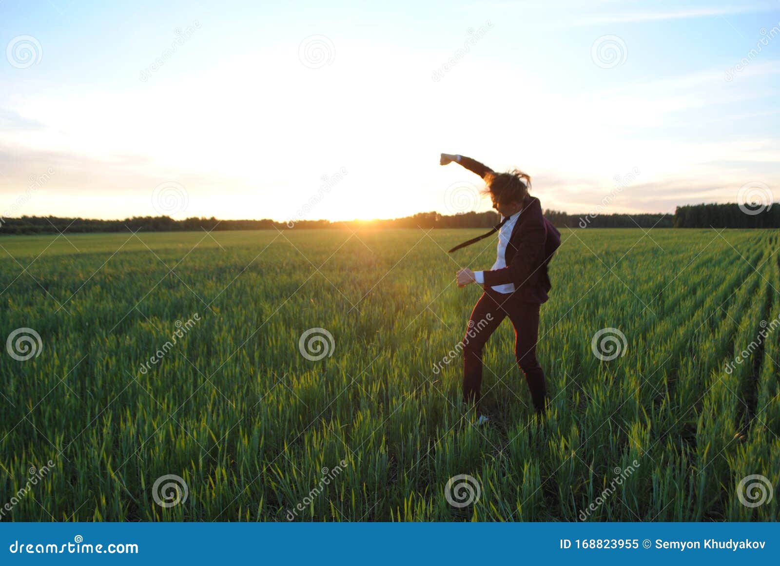 Dance on a wheat field. stock image. Image of cheerful - 168823955