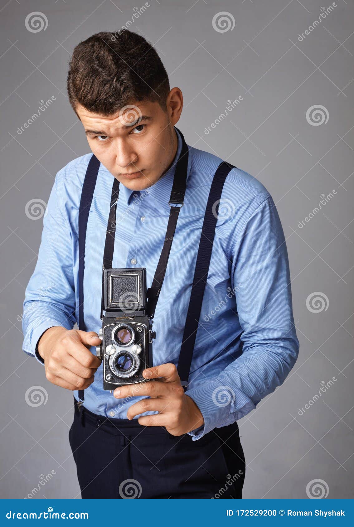 Guy with the Old Camera at the Studio. Guy Shoots on an Old Vintage ...