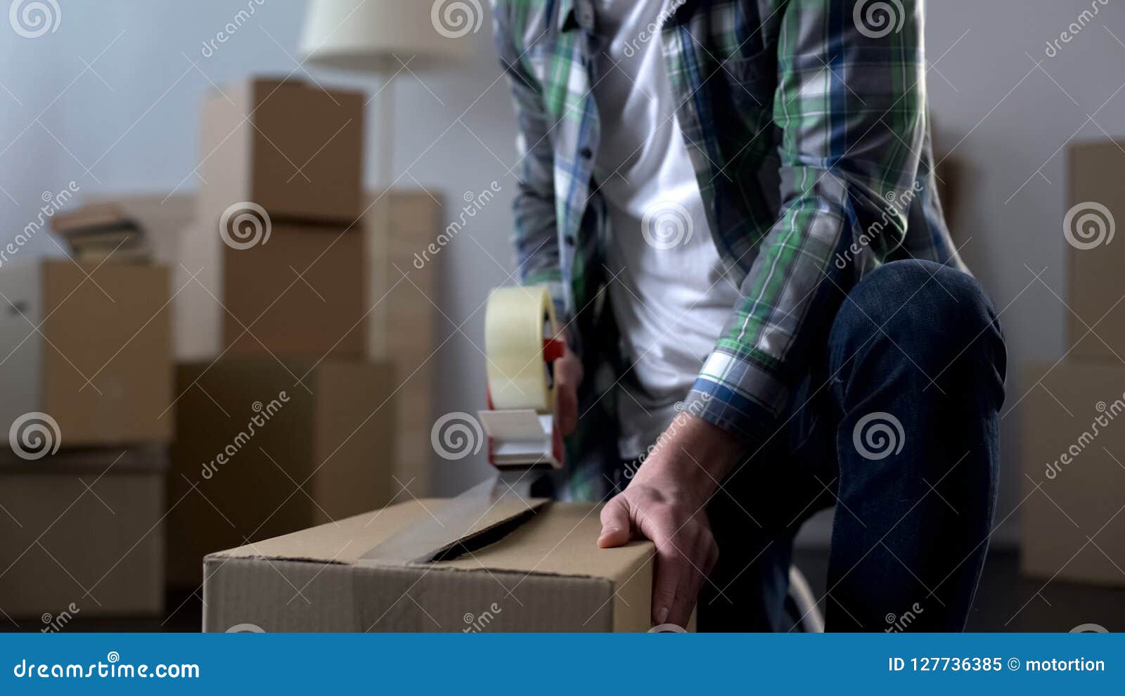 Guy Packing Boxes with Stuff, Moving from Apartment, End of Rent ...