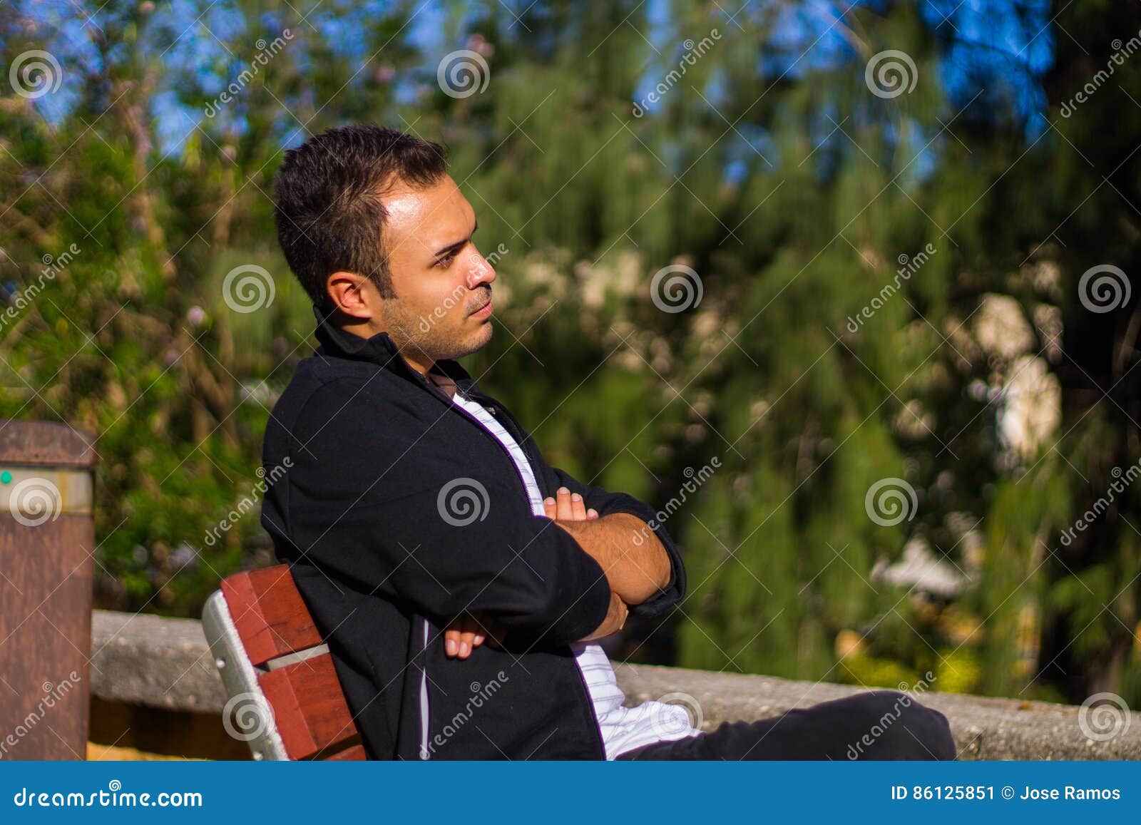 Guy on a park bench stock image. Image of landscape, fashion - 86125851
