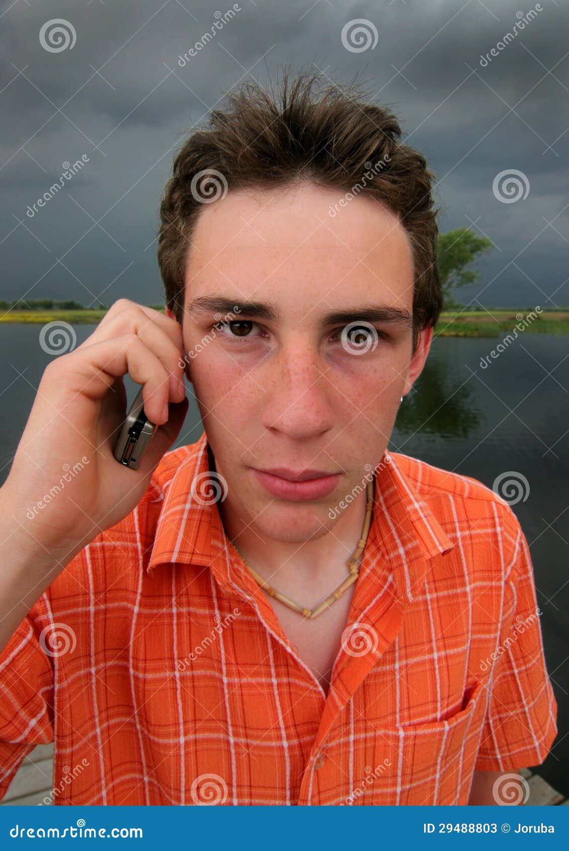 Guy phoning stock image. Image of hold, phone, lake, serious - 29488803