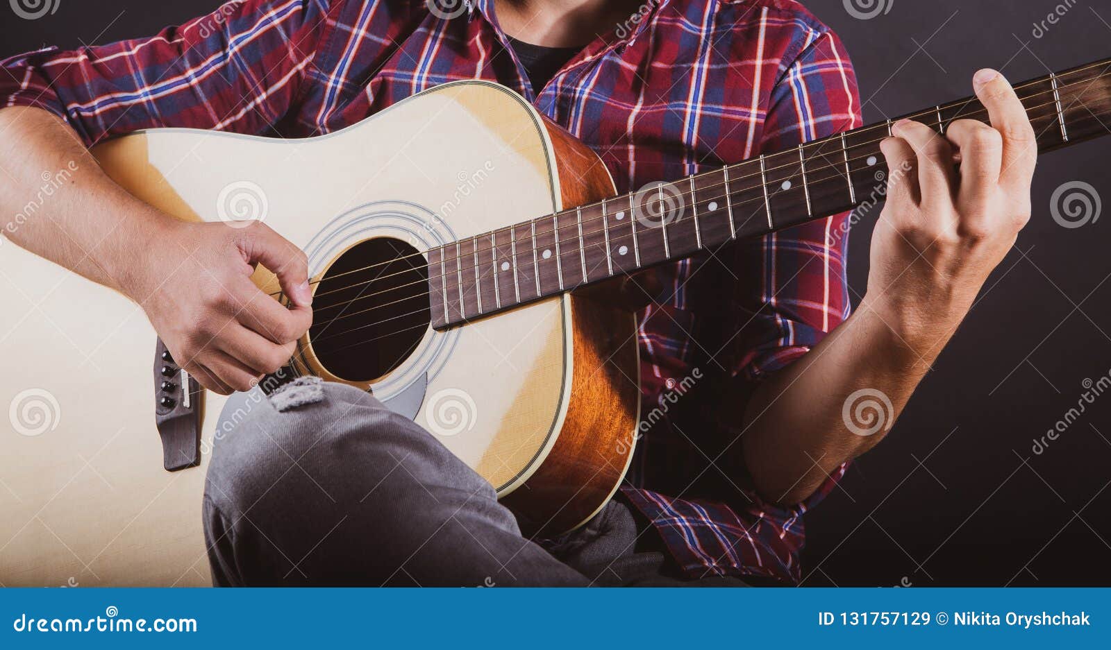 Guy Playing an Acoustic Guitar at a Recording Studio. Stock Image ...