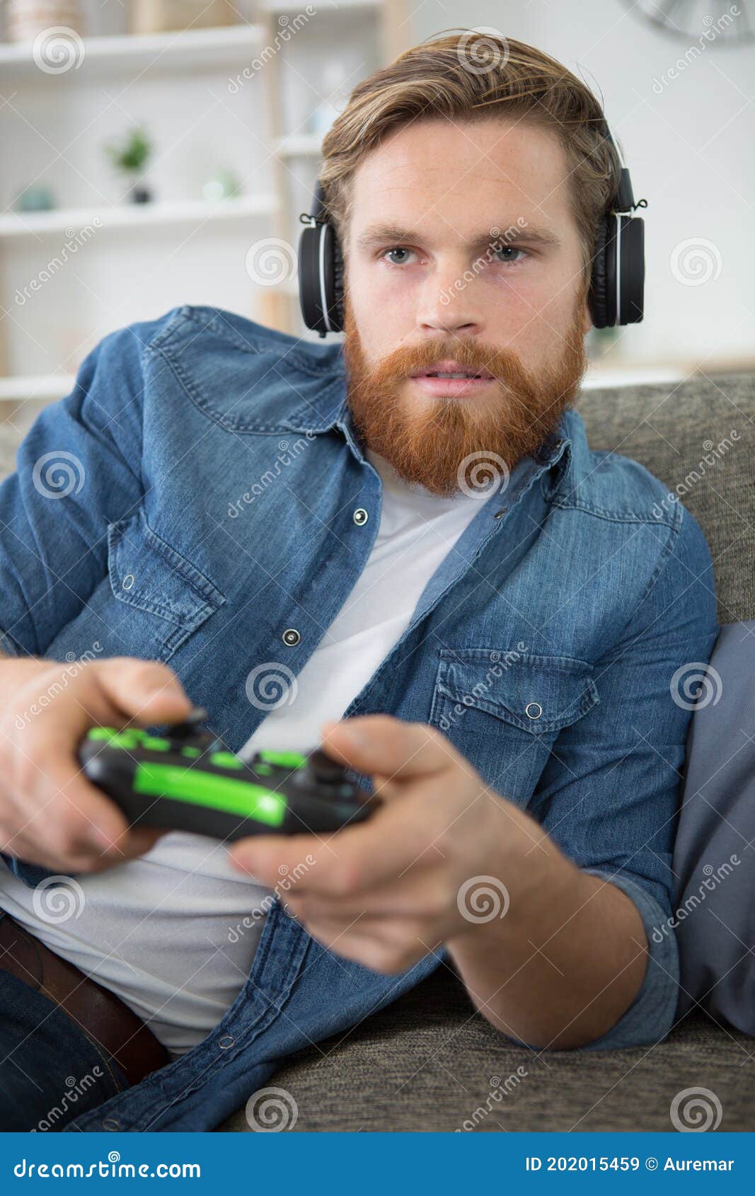 Guy playing on console stock image. Image of screen - 202015459