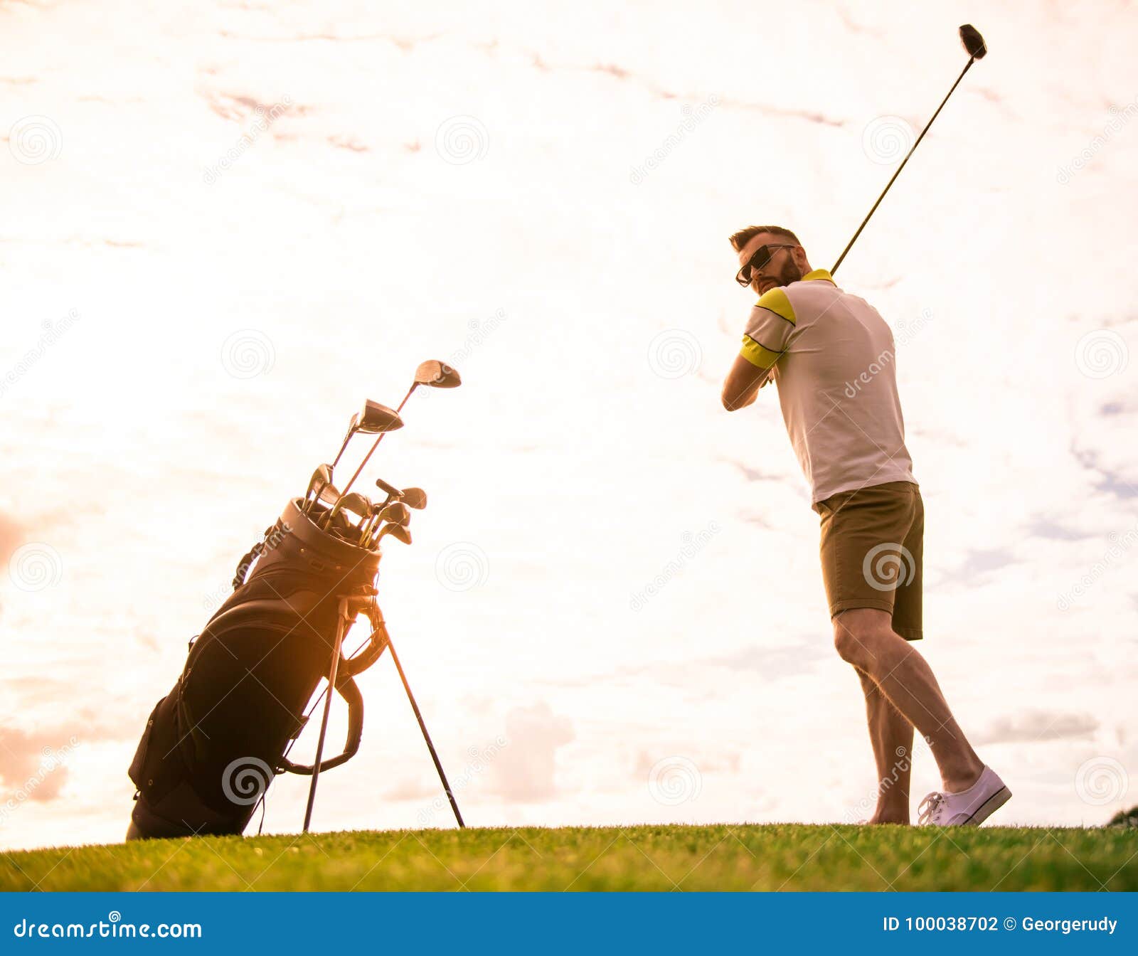 Guy playing golf stock photo. Image of healthy, male - 100038702