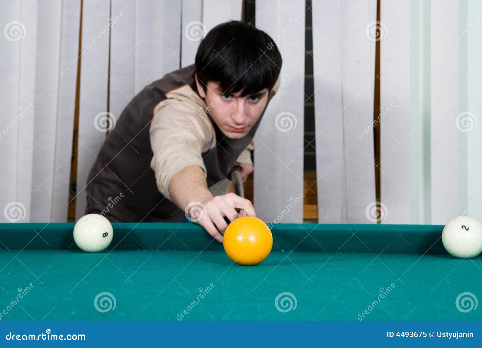 The guy plays billiards stock image. Image of black, club - 4493675