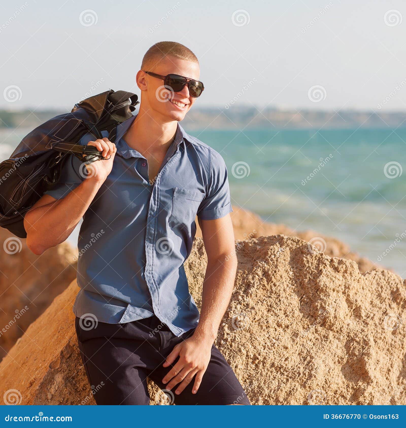 Guy posing on the beach stock photo. Image of beautiful - 36676770