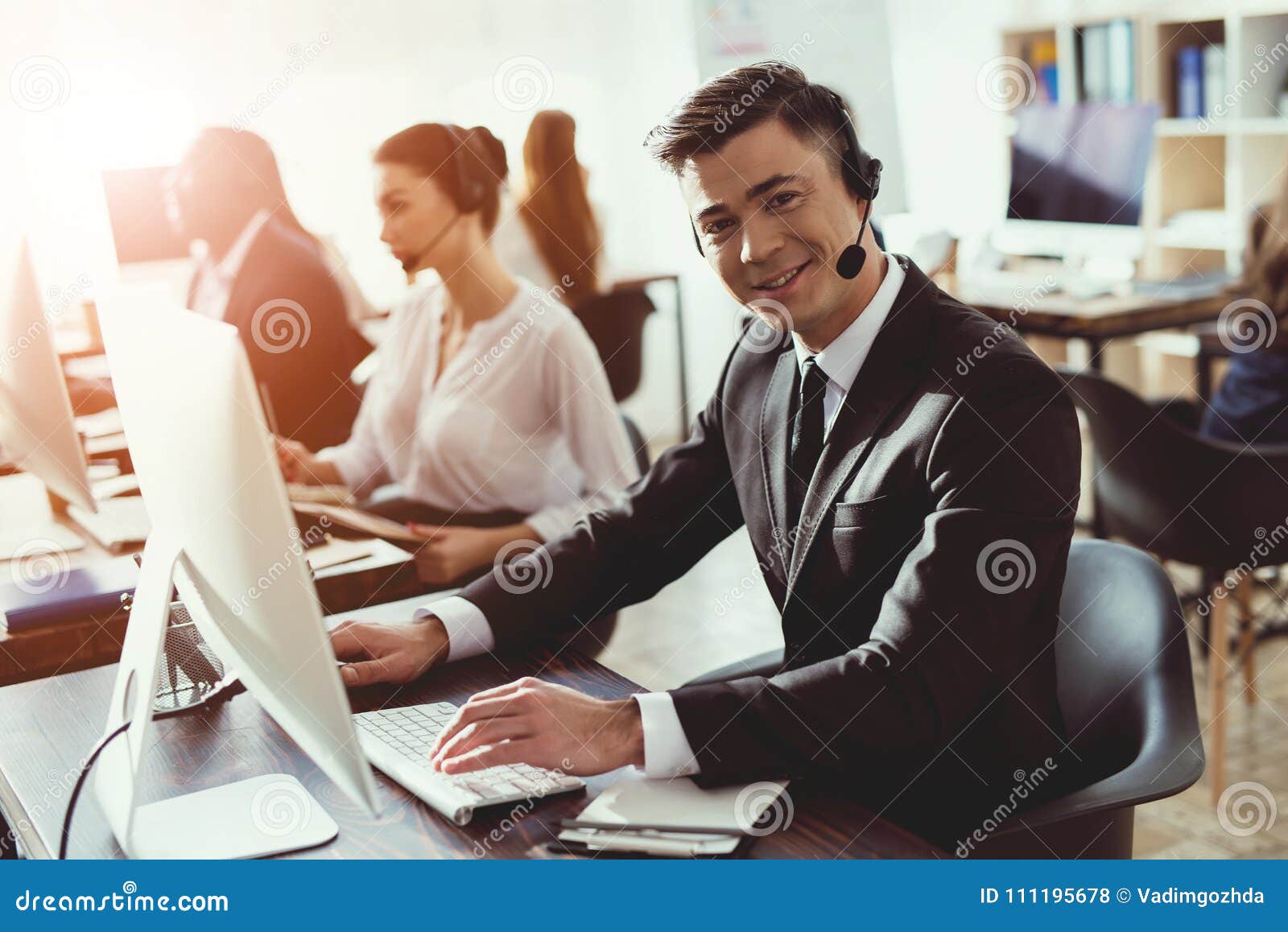 The Guy is Posing on the Camera in the Call Center. Stock Photo - Image ...
