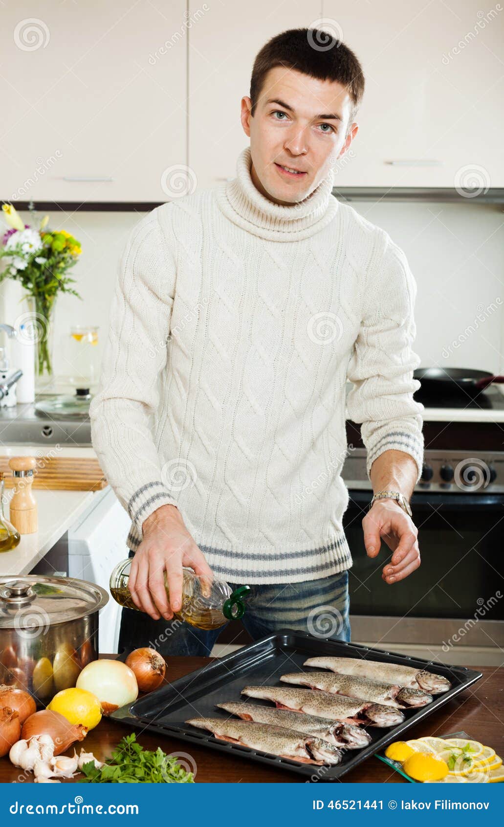 Guy Pouring Oil Raw Fish Roasting Pan Stock Photos - Free & Royalty ...