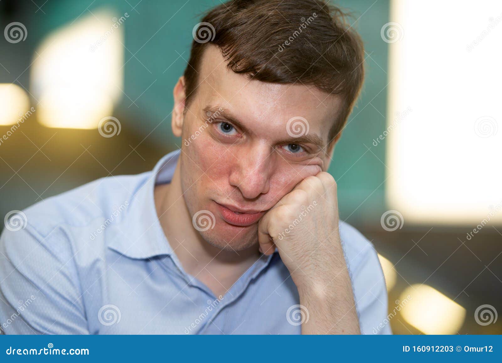 The Guy Propped His Chin on His Hand. Stock Image - Image of checkered ...