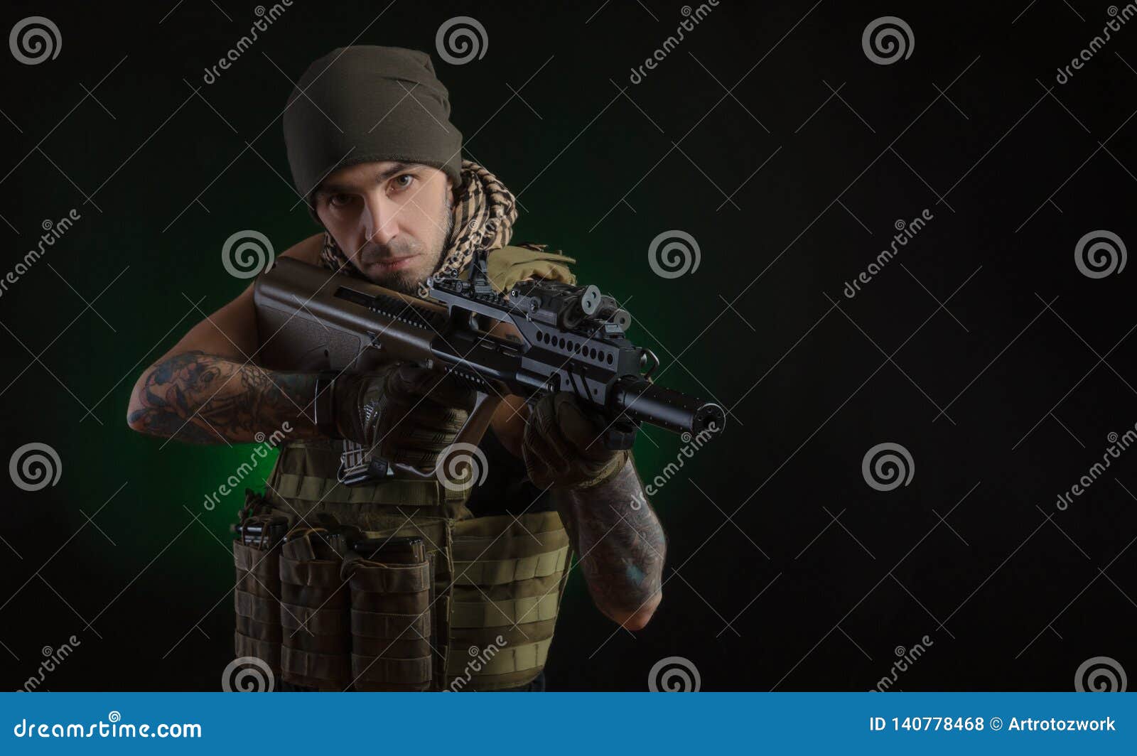 The Guy in Protective Clothing and a Black Mask with a Sniper Rifle ...