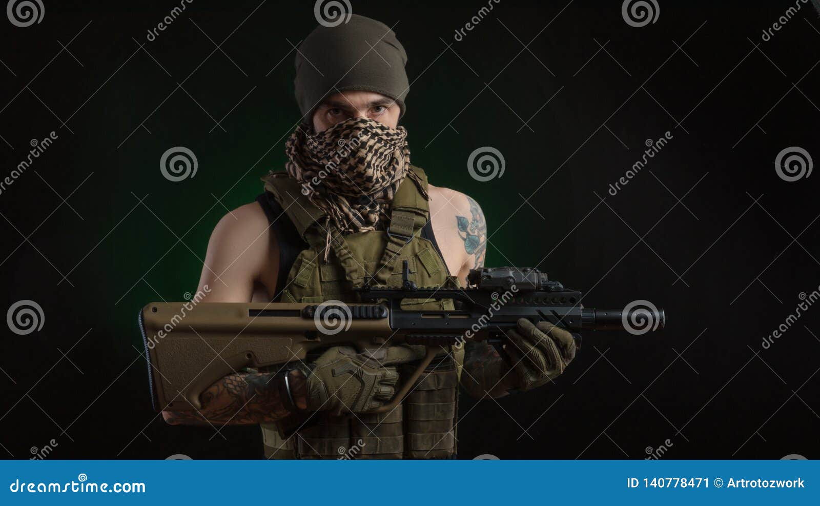 The Guy in Protective Clothing and a Black Mask with a Sniper Rifle ...