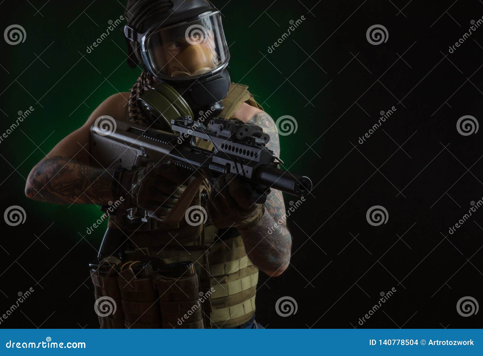 The Guy in Protective Clothing and a Black Mask with a Sniper Rifle ...