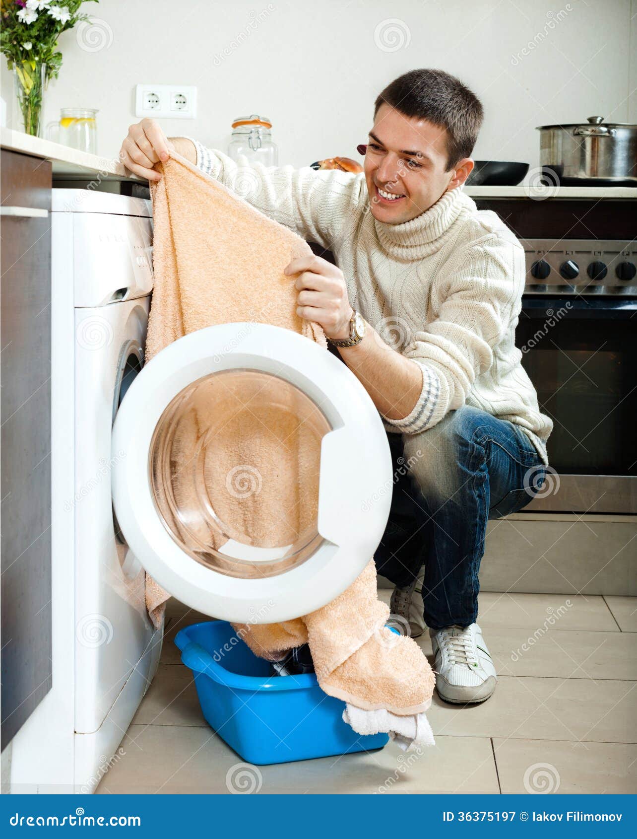 Guy Putting Clothes in To Washing Machine Stock Image - Image of ...