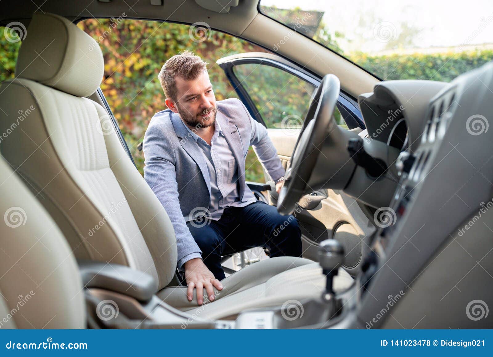 Guy Reaching for the Driver Spot Stock Photo - Image of healthcare ...