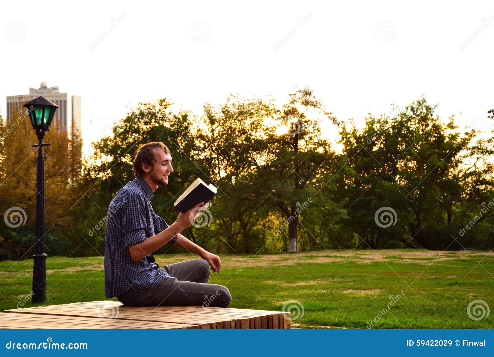 Guy reading book stock image. Image of blue, city, model - 59422029