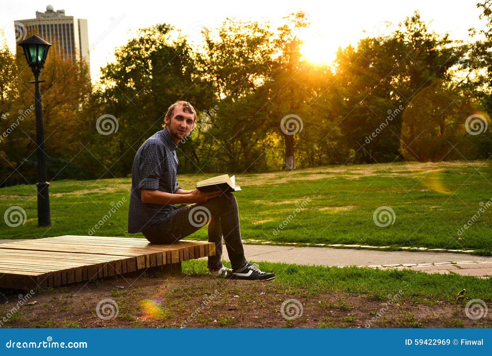 Guy reading book stock image. Image of blue, novel, people - 59422969