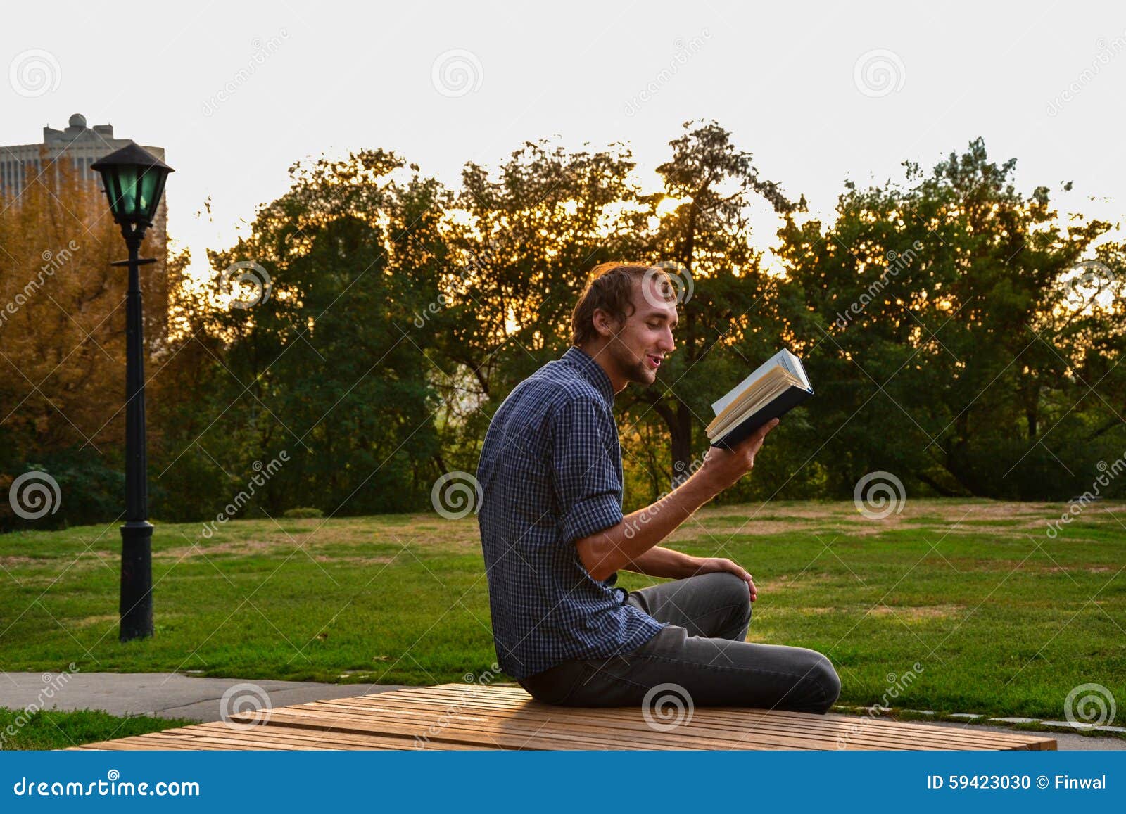 Guy reading book stock photo. Image of poem, novel, male - 59423030