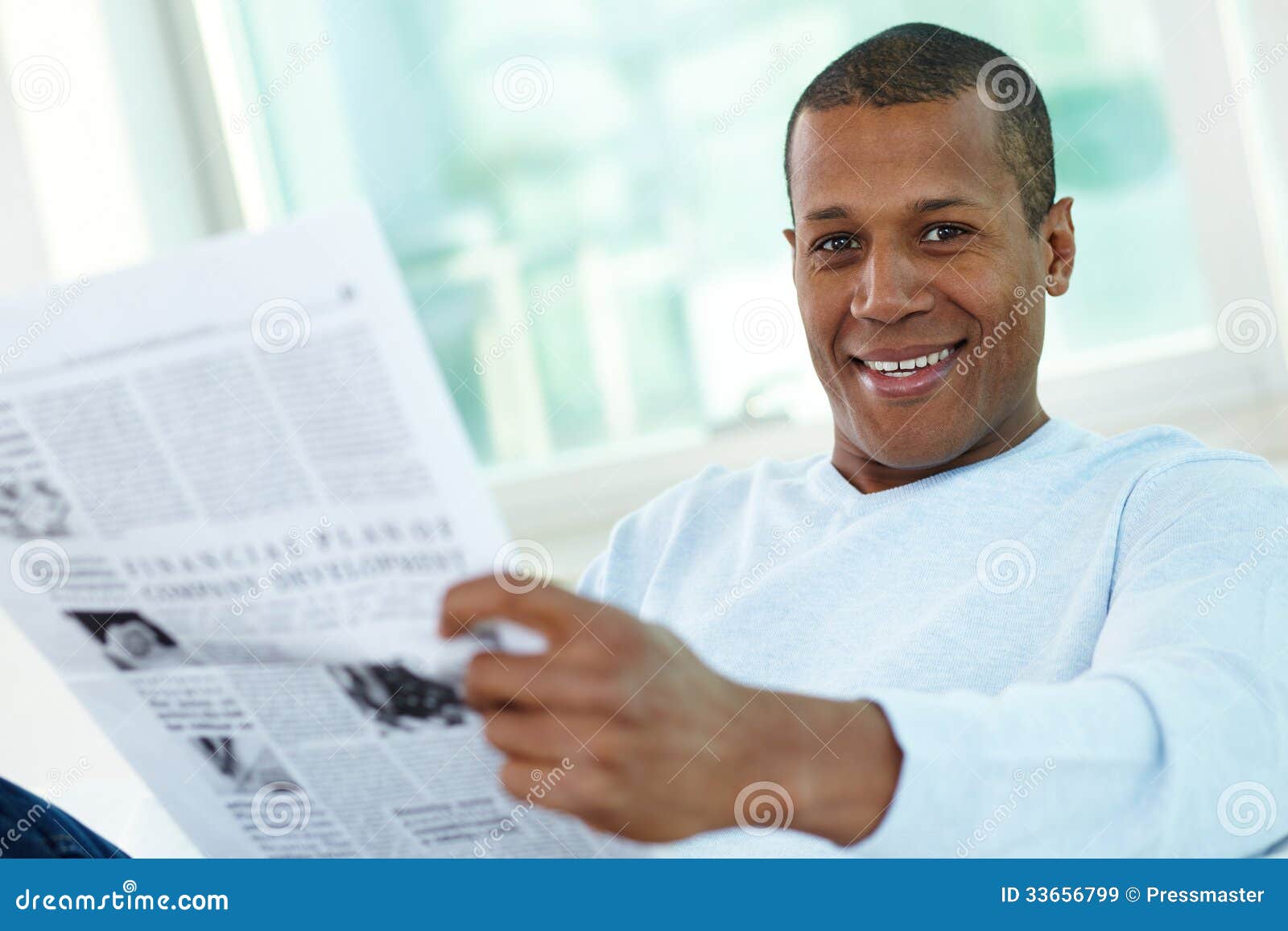 Guy reading newspaper stock image. Image of business - 33656799