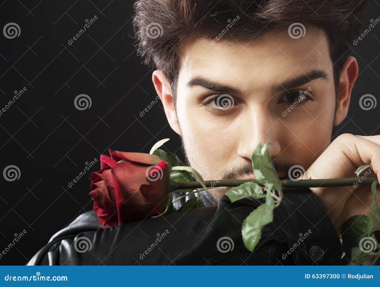 Guy with a red rose stock photo. Image of camera, dating - 63397300